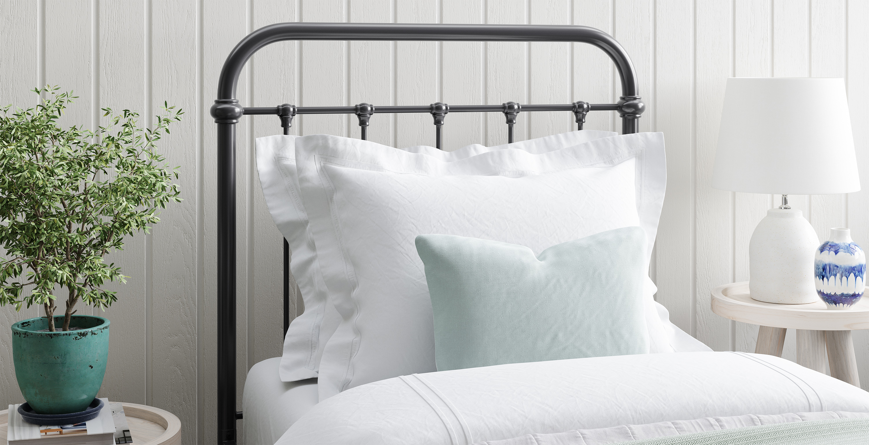 Feather and black metal bed store